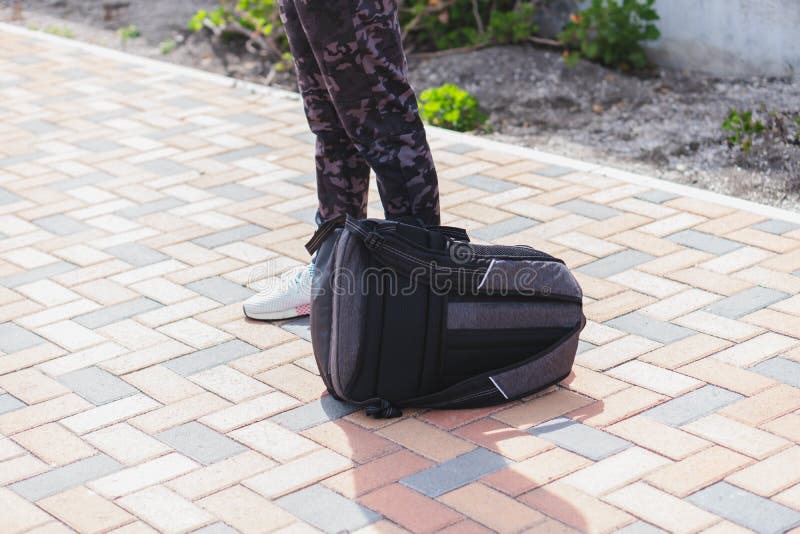 Backpack Laying at a Males Feet Outdoors Stock Image - Image of travel ...