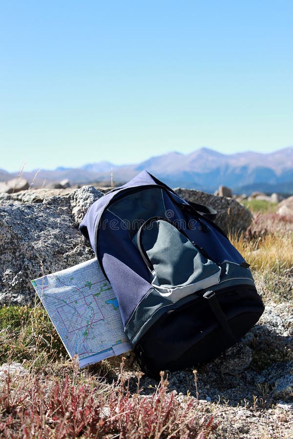 Backpack and map stock image. Image of navigate, climb - 16121913