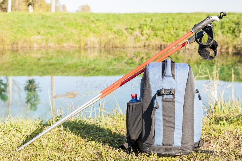 Backpack and Nordic Walking Sticks Stock Photo - Image of backpack ...