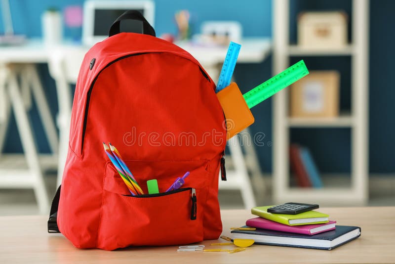 Backpack with School Supplies on Table Indoors Stock Image - Image of ...