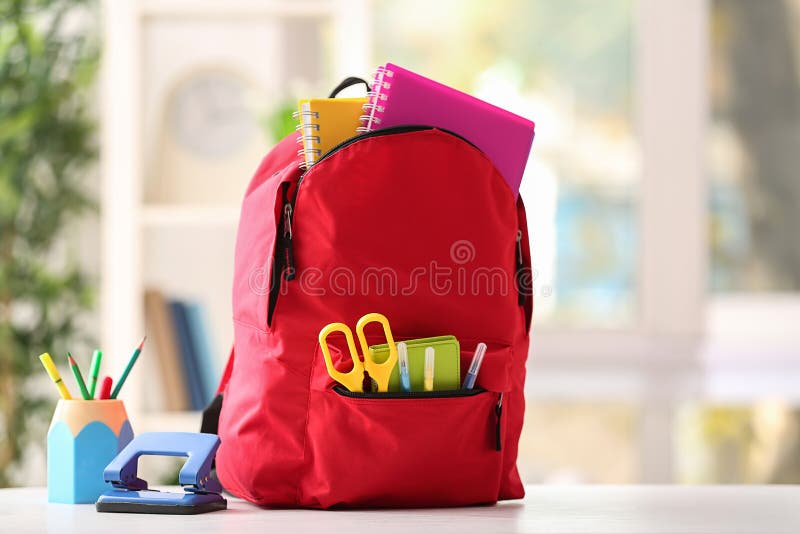 Backpack with School Supplies on White Table Stock Photo - Image of ...