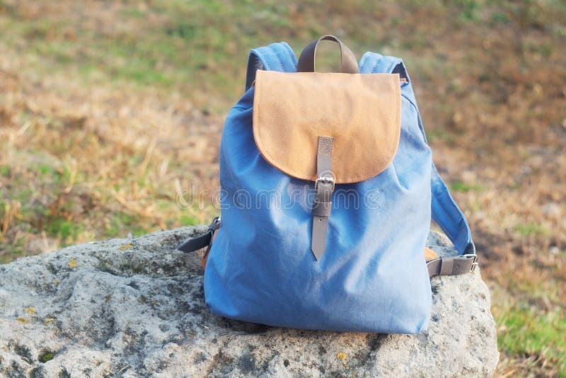 Backpack on the stone stock image. Image of cotton, object - 70779893