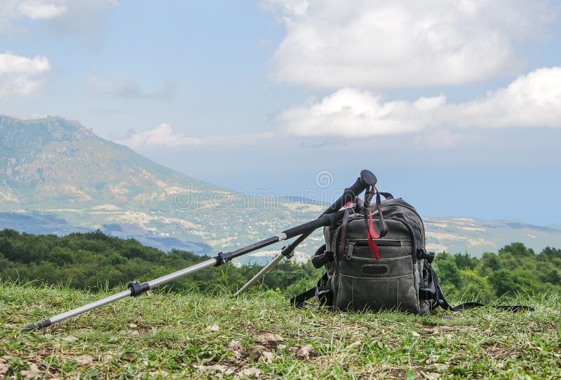 Backpack and Trekking Poles Stock Photo - Image of cliff, pretty: 74254478