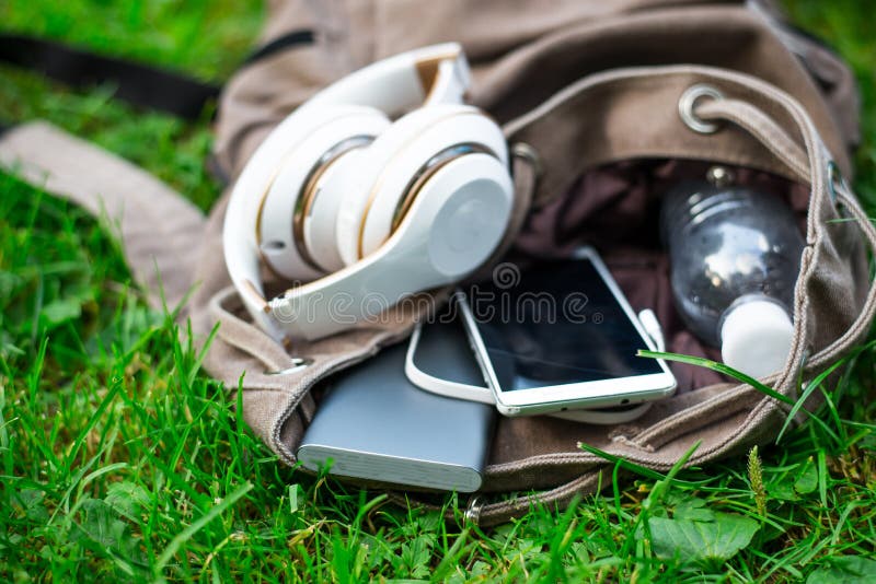 Backpack with Water, Mobile Phone and Powerbank Inside Stock Image ...