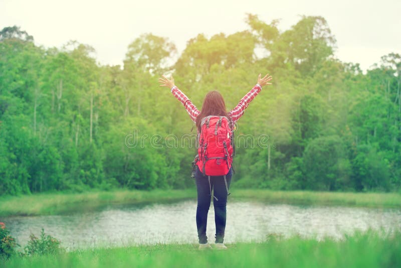 Backpack woman open hand stock photo. Image of hill - 120750096