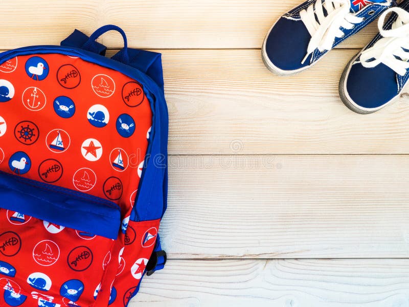 Backpack on the Wooden Background Stock Photo - Image of footwear ...