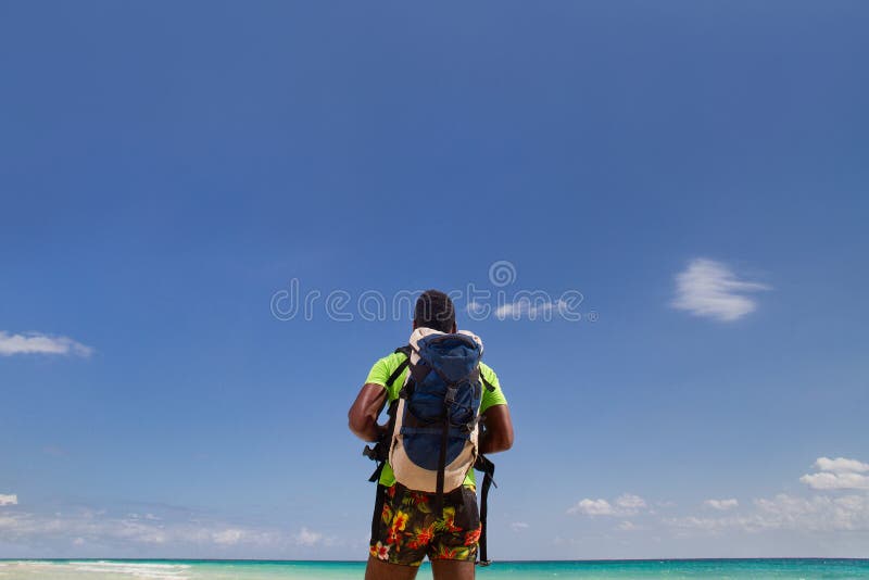 Backpacker at the beach stock image. Image of positive - 102107497
