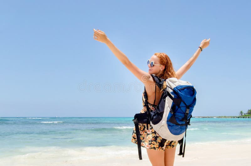 Backpacker at beach stock image. Image of seaside, redhead - 73701073