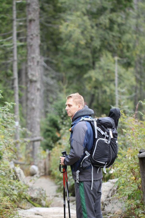 Backpacker Hiking in Mountains Stock Photo - Image of rocks, trekker ...