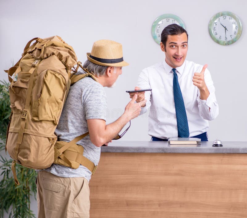 Backpacker at the Hotel Reception Stock Image - Image of arrival ...