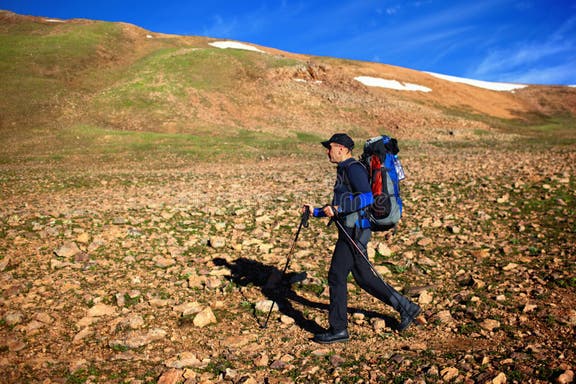 Backpacker in mountains stock image. Image of pursuit - 23312175