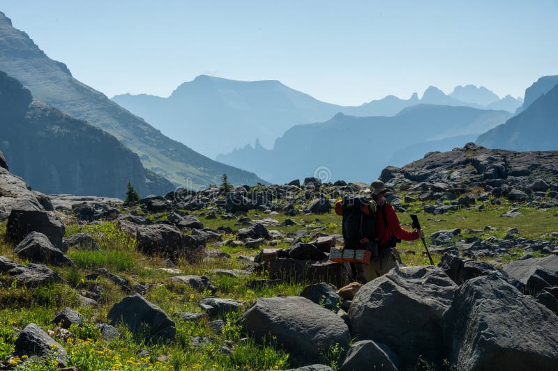 Backpacker Navigates through Rocky Field on Boulder Pass Stock Photo ...