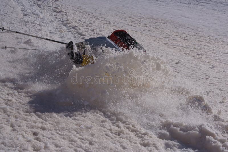 Backpacker Slipping on Wet Snow and Falling Down a Slope Stock Photo ...