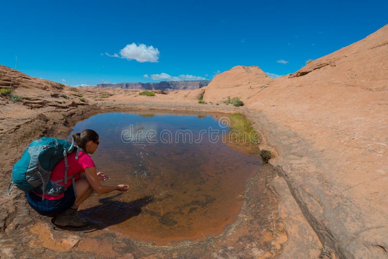 Backpacker Splashing Water, Stock Image - Image of beauty, sandstone ...