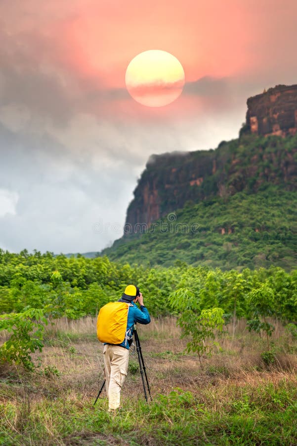 Backpacker taking photos stock image. Image of canyon - 150208531