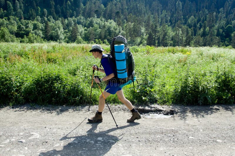 Backpacker Tourist on the Road. Stock Image - Image of hike, backpacker ...