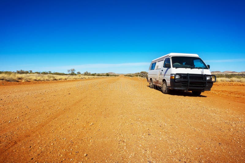 Backpacker Van on a Desert Road Stock Photo - Image of land, brown ...