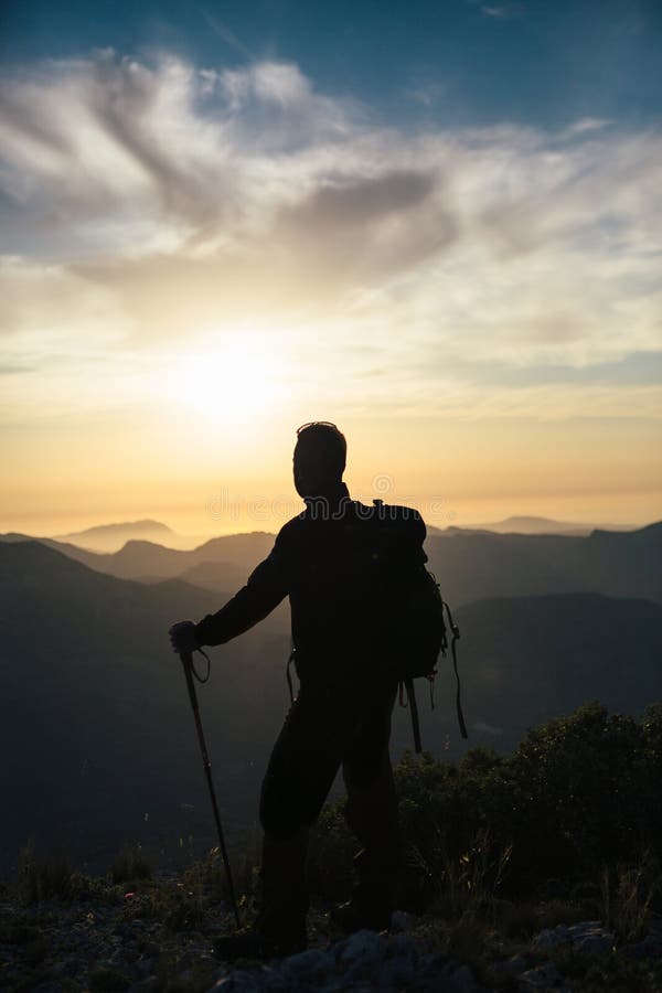 Backpacker Viewing Idyllic Scene in Mountains Stock Image - Image of ...