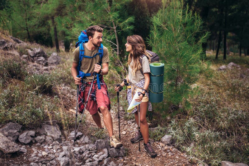 Backpackers Hiking Uphill Mountain Trail Stock Photo - Image of effort ...