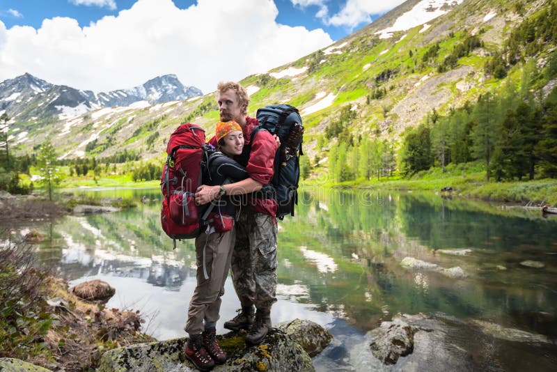 Backpackers Rest in Green Highlands of Altai Mountains Stock Image ...