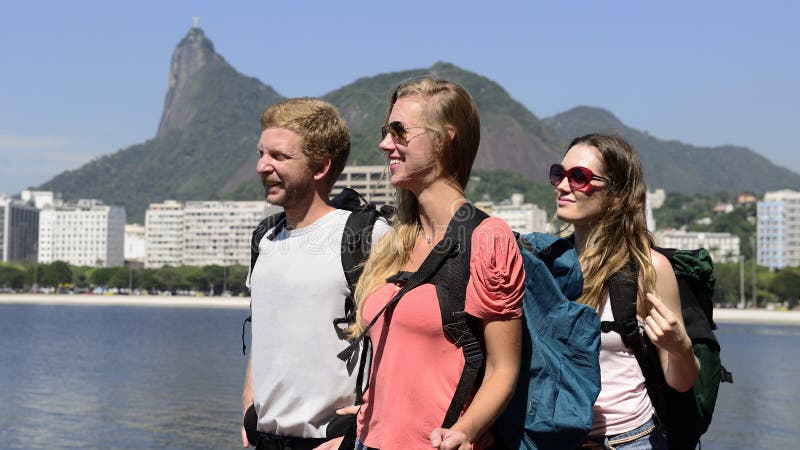 Backpackers Tourists in Rio De Janeiro Looking at Christ the Redeemer ...