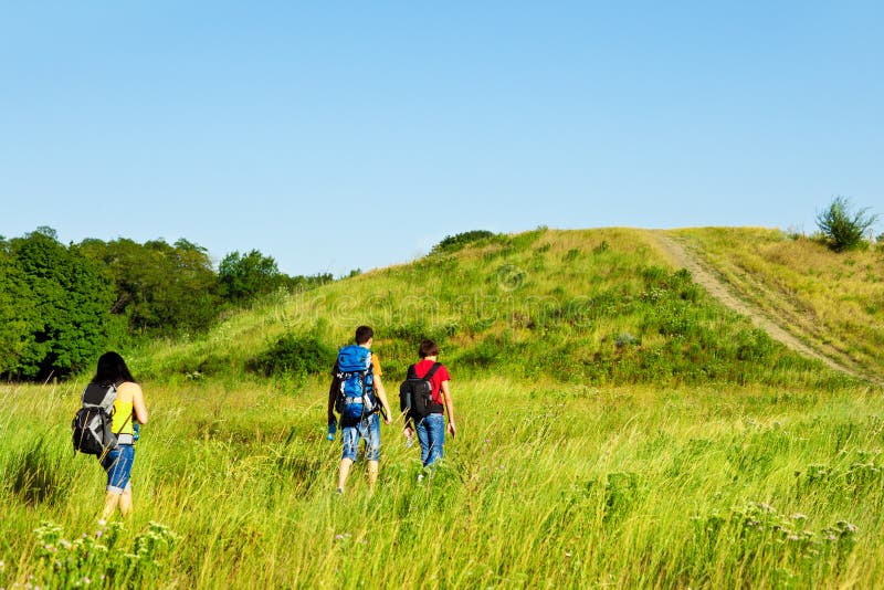 Backpackers travelling stock image. Image of backpack - 27961545