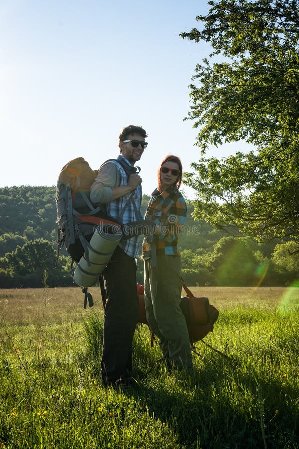 Backpackers stock photo. Image of stop, road, love, hitchhiking - 44745632