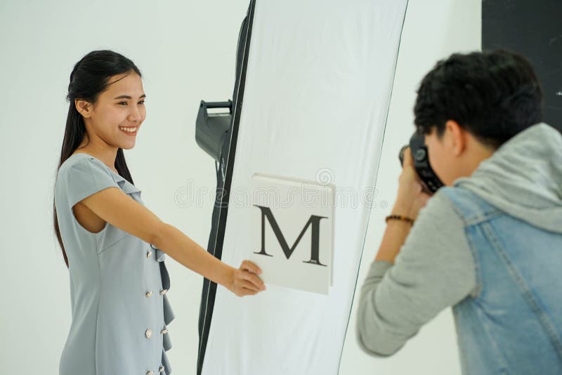 Backstage Behid the Scean of the Photo Session: the Photographer Using ...