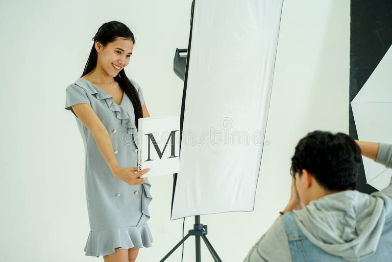 Backstage Behid the Scean of the Photo Session: the Photographer Using ...