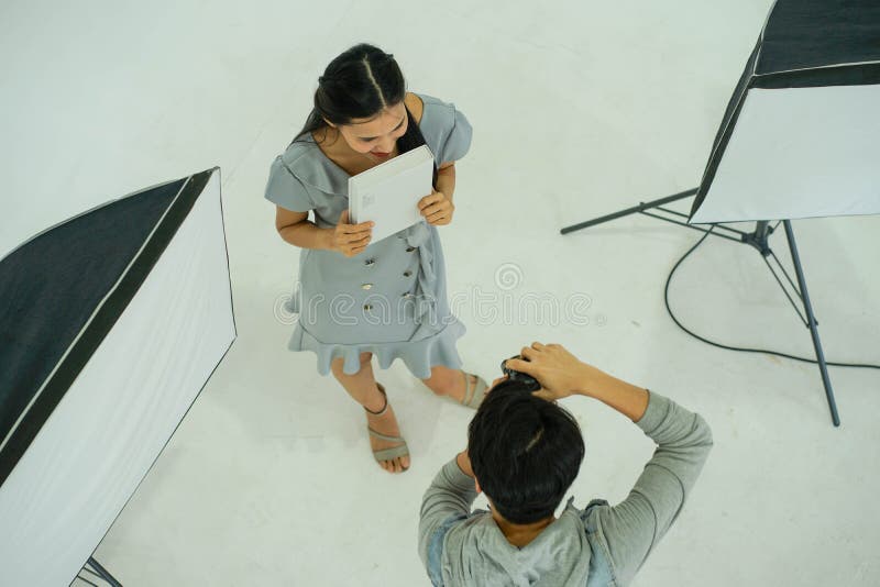 Backstage Behid the Scean of the Photo Session: the Photographer Using ...