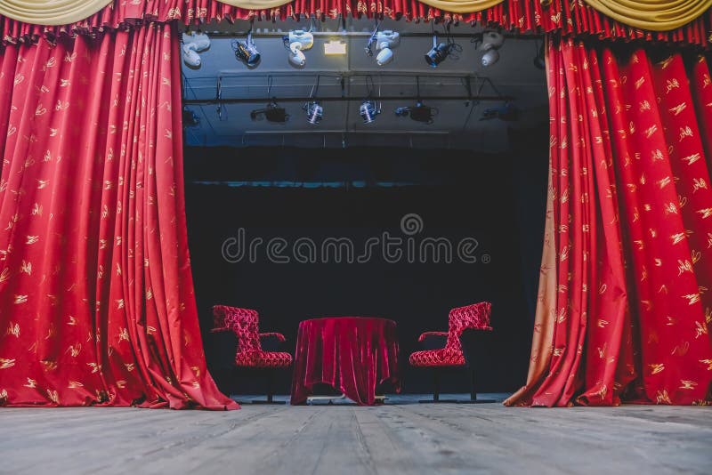 The Backstage of the Theater, with a Table and Chairs in the Center ...