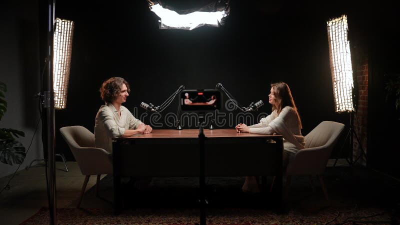 Engaging Conversation in a Modern Podcast Studio with Expert ...