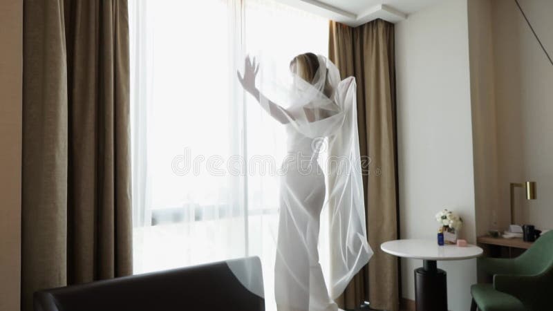 Backstage Wedding Shooting. the Bride Dances by the Window. Stock Video ...