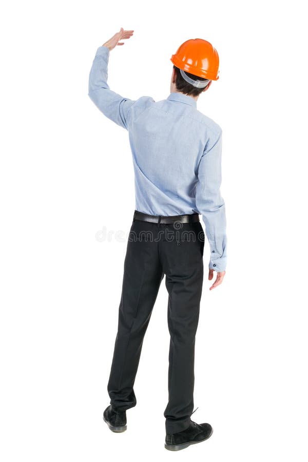 Backview of an Engineer in Construction Helmet Stands. Standing Stock ...