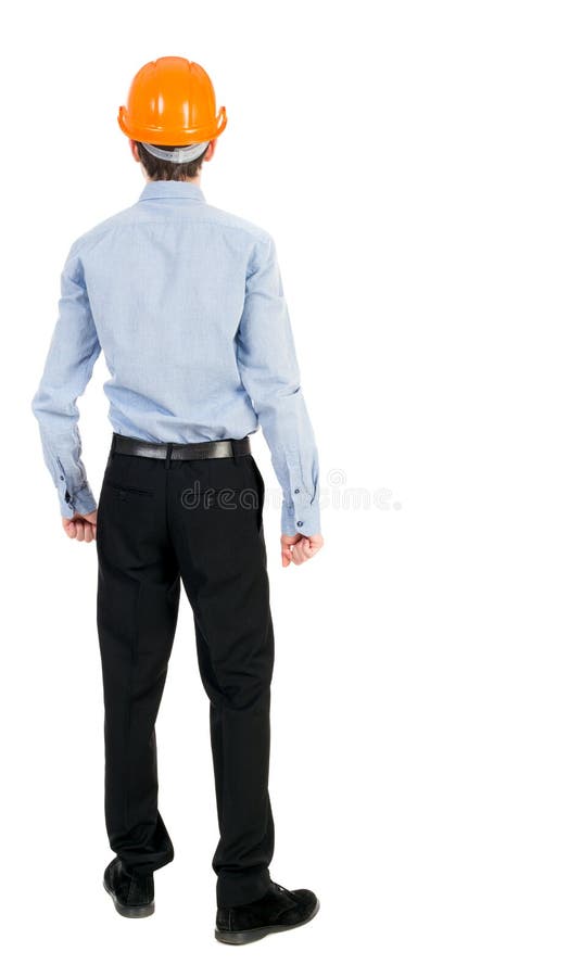 Backview of an Engineer in Construction Helmet Stands. Stock Image ...