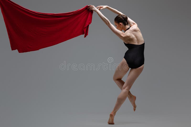 Backview Shot of Ballerina in Tutu with Red Cloth Stock Photo - Image ...