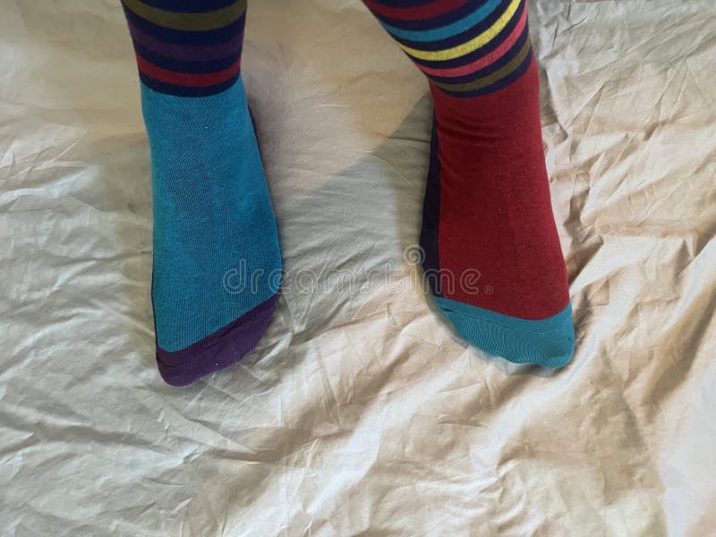 Backwards Feet Wearing Mismatched Socks Stock Image - Image of garment ...