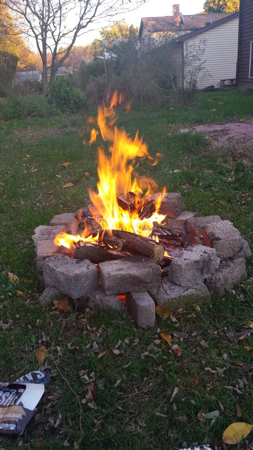 Bonfire In Backyard Between Rocks And Grass In Night Stock Photo ...