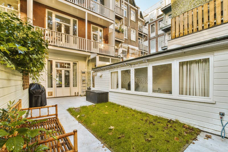 The Backyard of a House with a Yard in Front Stock Photo - Image of ...