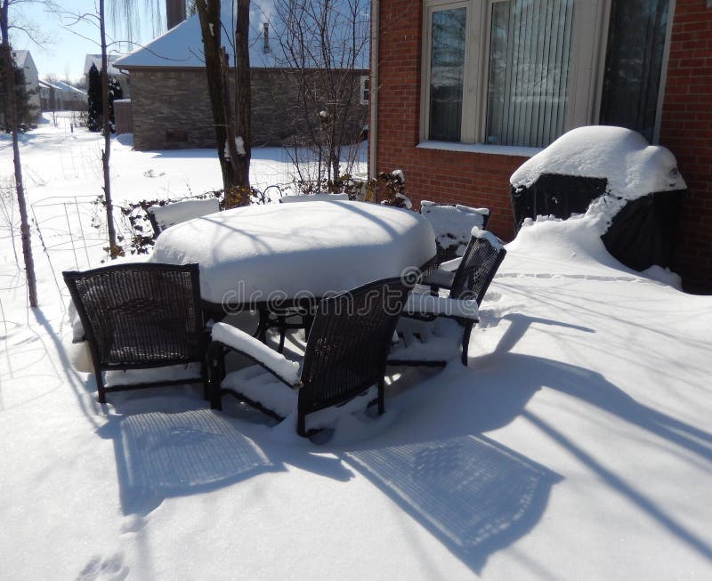 Backyard Outdoor Table and Chairs in Winter Stock Photo - Image of ...