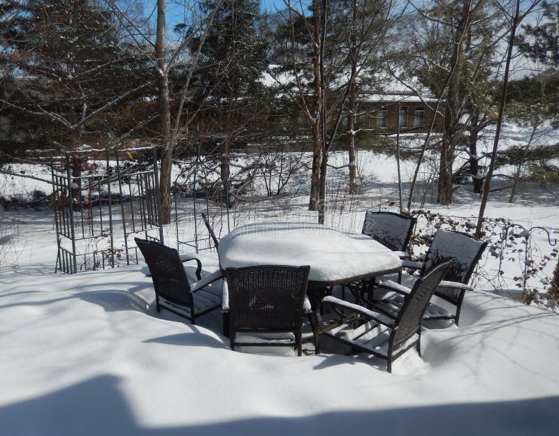 Backyard Outdoor Table and Chairs in Winter Stock Photo - Image of ...