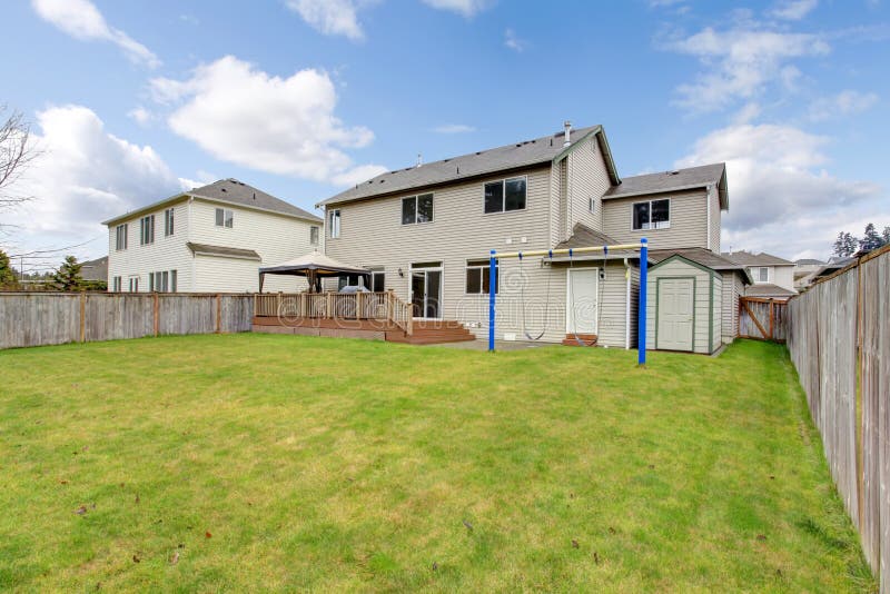 Backyard with Typical American House and Fence. Stock Image - Image of ...
