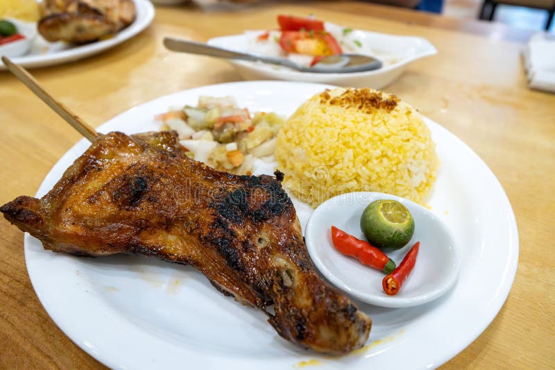 Bacolod Style Inasal Chicken with Java Rice and Vegetables Stock Photo ...