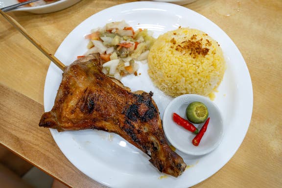 Bacolod Style Inasal Chicken with Java Rice and Vegetables Stock Photo ...