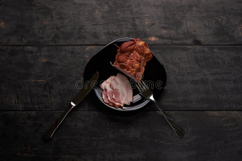 Bacon on a Black Plate on a Wooden Table Stock Photo - Image of pork ...
