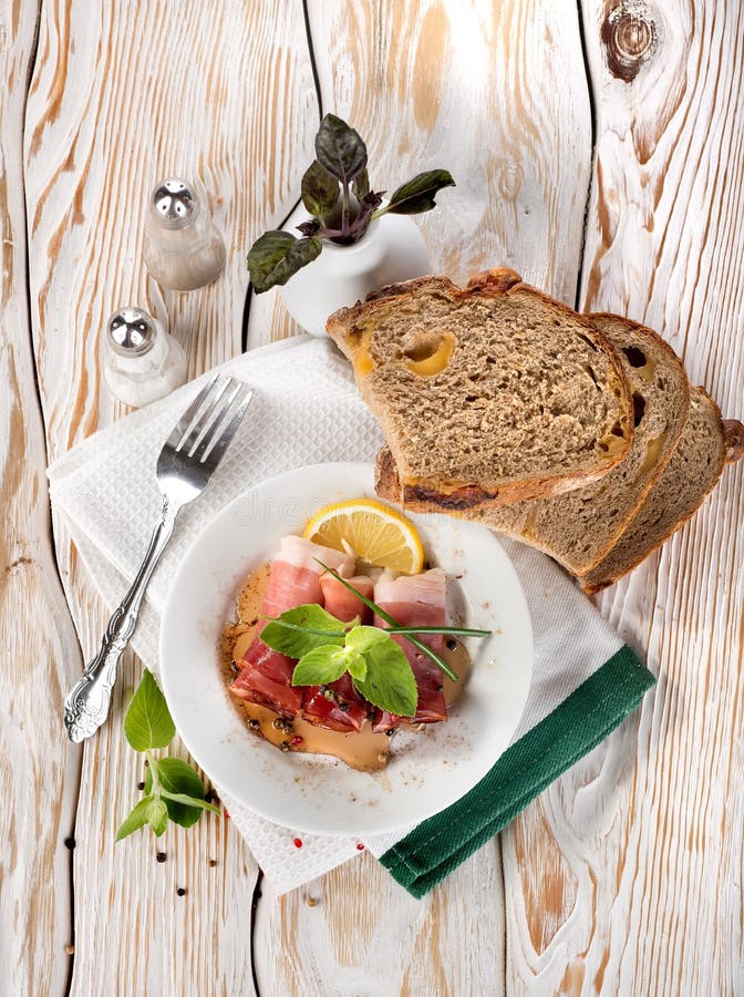 Bacon and Bread on a Wooden Table Stock Photo - Image of mint, dishes ...