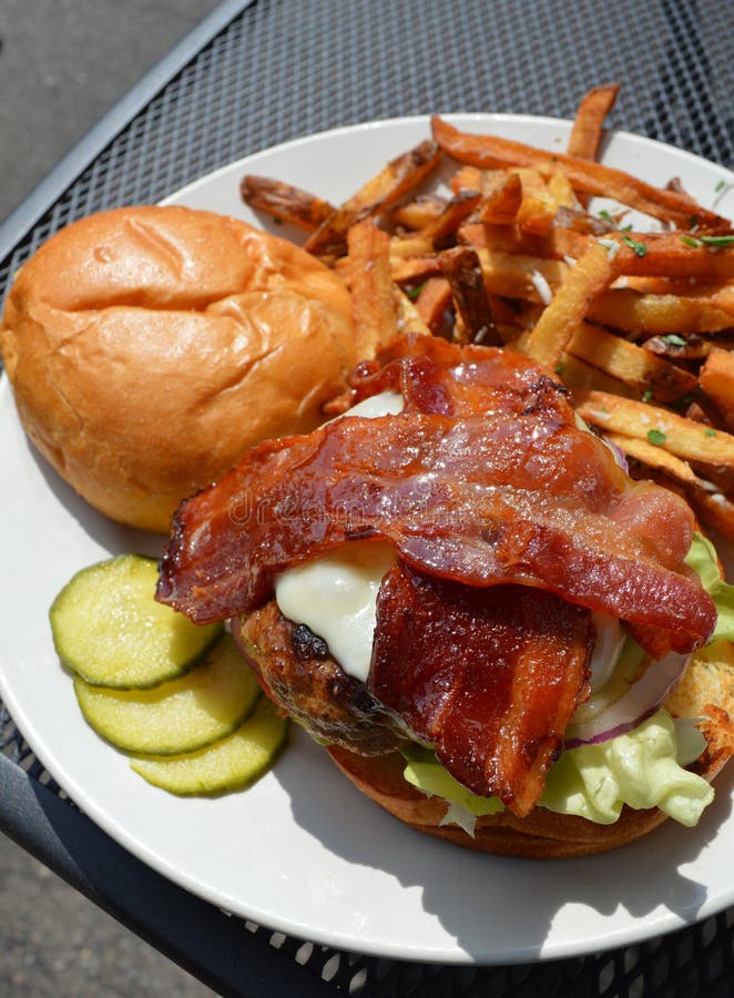 Bacon Cheese Burger with a Side of Fries Stock Photo - Image of ...