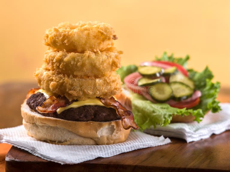 Bacon Cheeseburger with Stack of Onion Rings Stock Image - Image of ...