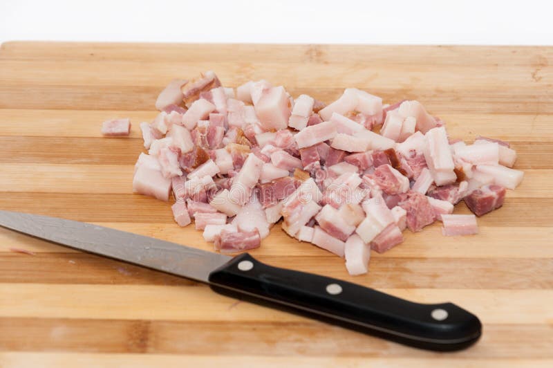 Bacon Cubes with Knife on the Wooden Board Stock Image - Image of diced ...