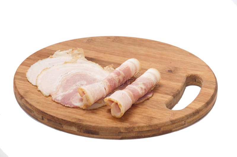 Bacon Cut into Slices on a Wooden Board Stock Photo - Image of smoked ...
